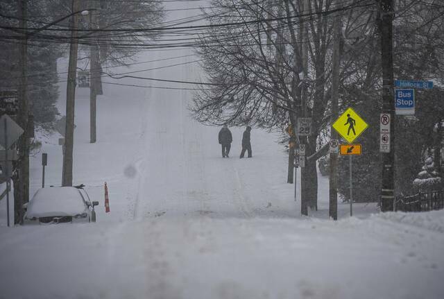 Photos of the day: Winter storm leaves neighborhoods coated in snow